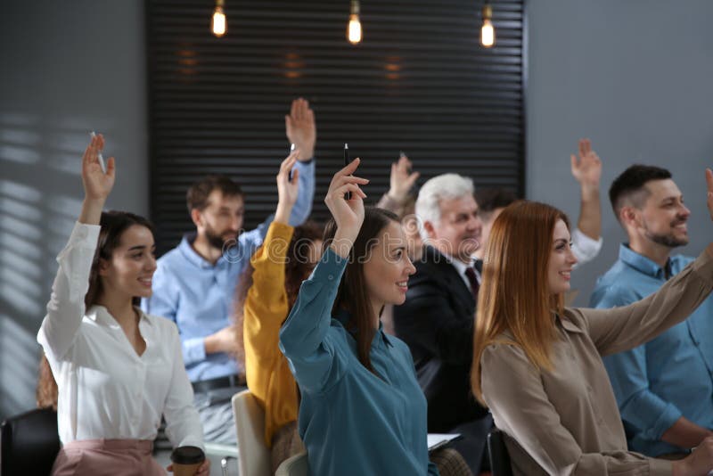 People Raising Hands To Ask Questions at Seminar Stock Image - Image of ...