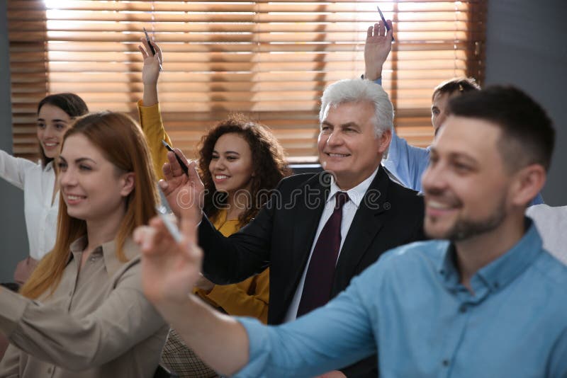 People Raising Hands To Ask Questions at Seminar Stock Image - Image of ...