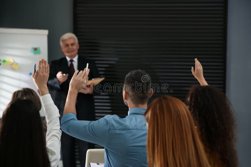 People Raising Hands To Ask Questions at Seminar Stock Image - Image of ...