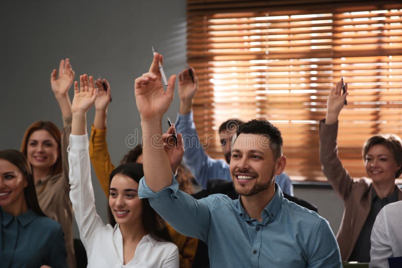 People Raising Hands To Ask Questions at Seminar Stock Photo - Image of ...