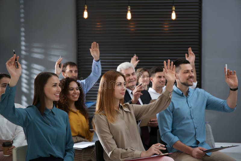 People Raising Hands To Ask Questions at Seminar Stock Image - Image of ...