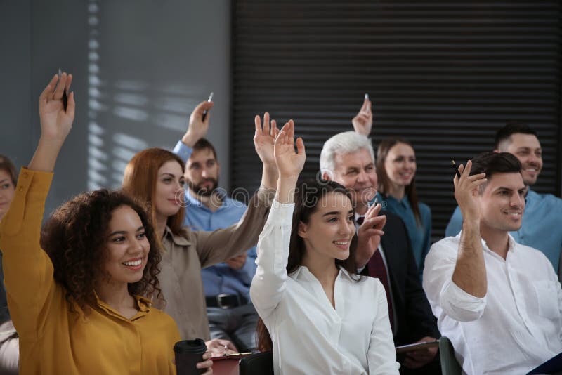 People Raising Hands To Ask Questions at Seminar Stock Image - Image of ...