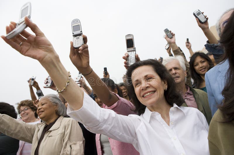People Raising Mobile Phone Stock Photo - Image of ethnic, person: 29654798