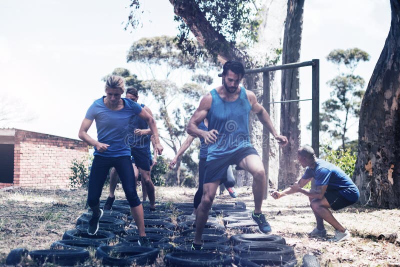 People Receiving Tire Obstacle Course Training Stock Image - Image of ...