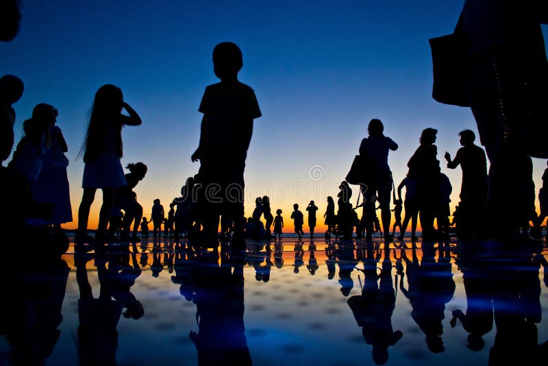 People Reflections on Colorful Sunset Stock Photo - Image of pedestrian ...