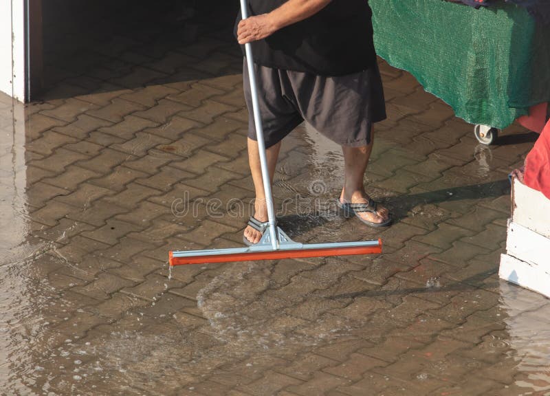 People Remove Water from the Street Stock Photo - Image of summer, work ...