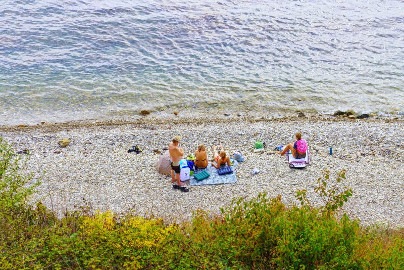 People Rest on a Rocky Beach, Top View Editorial Image - Image of ...