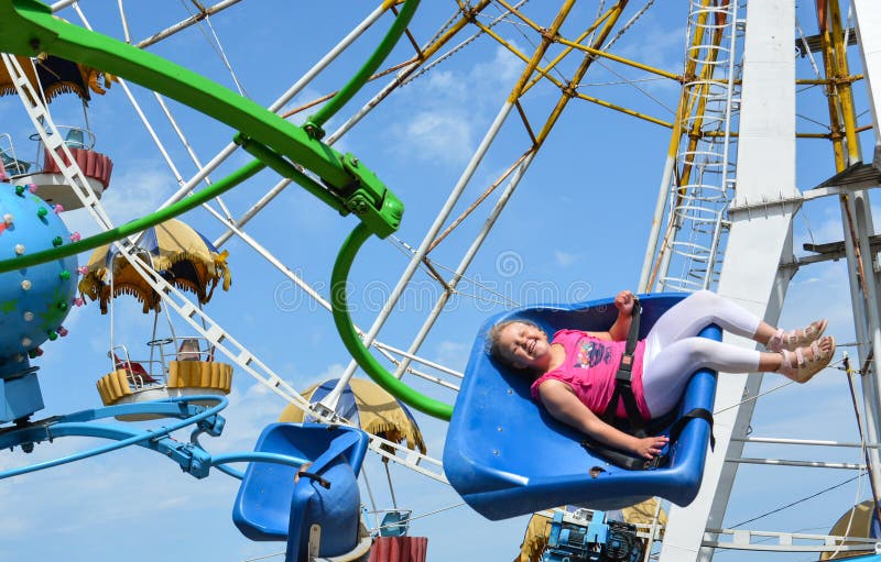 People Ride Rides in an Amusement Park. Stock Image - Image of ride ...