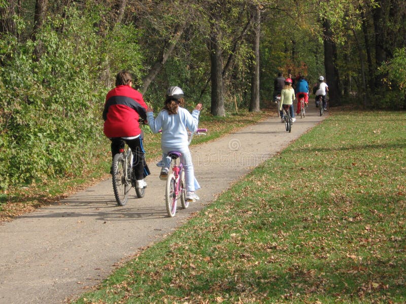 People Riding Their Bikes stock photo. Image of people - 392414