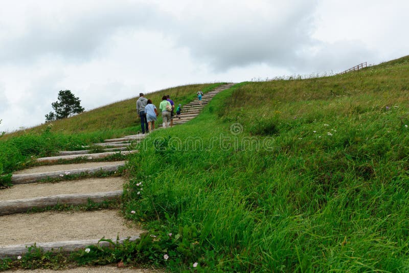 People rise by the hill stock photo. Image of paganism - 64809340