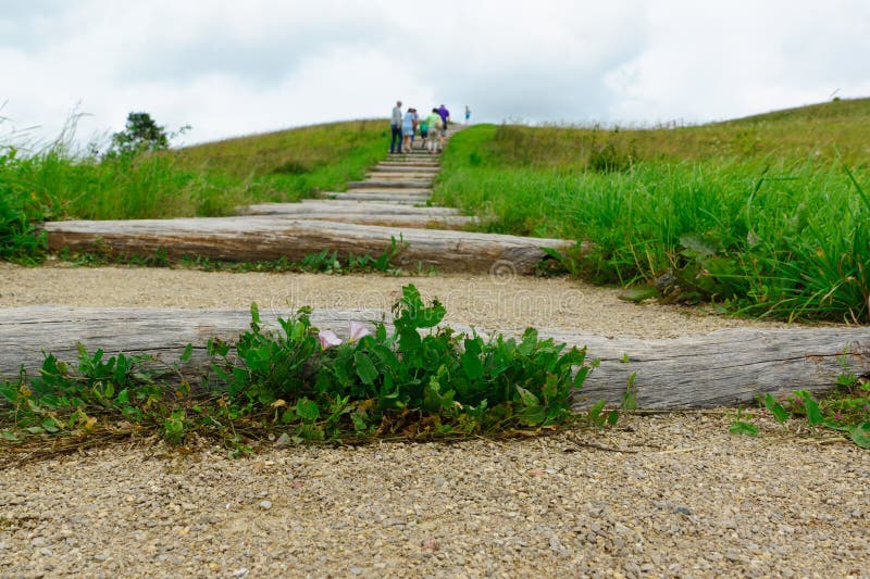 People rise by the hill stock photo. Image of heap, rural - 70662796