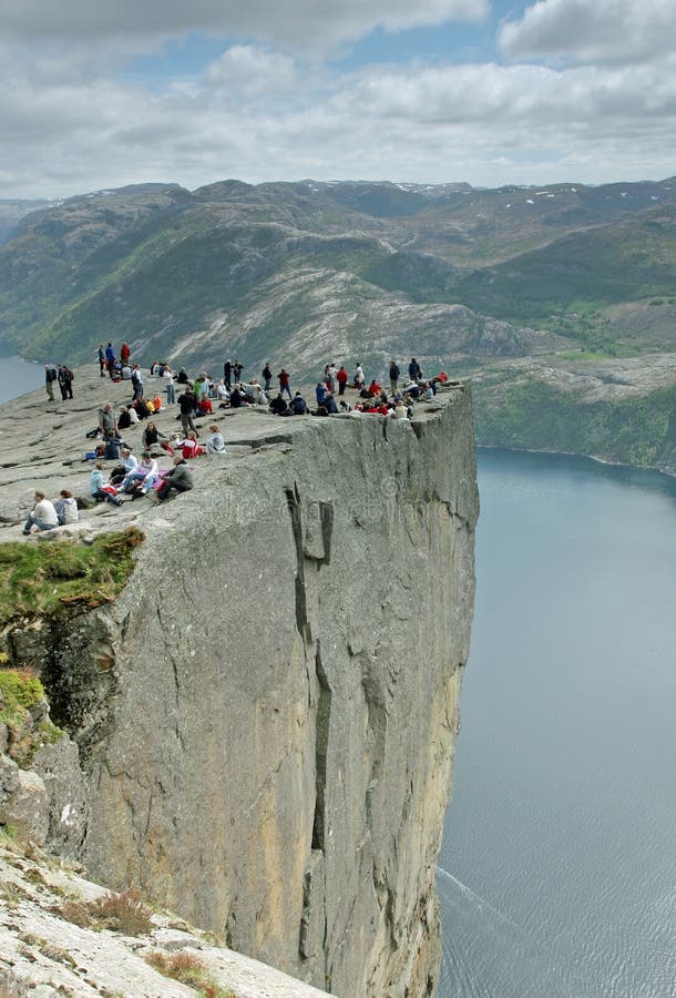 People on the rock stock image. Image of clouds, norwegian - 4674595