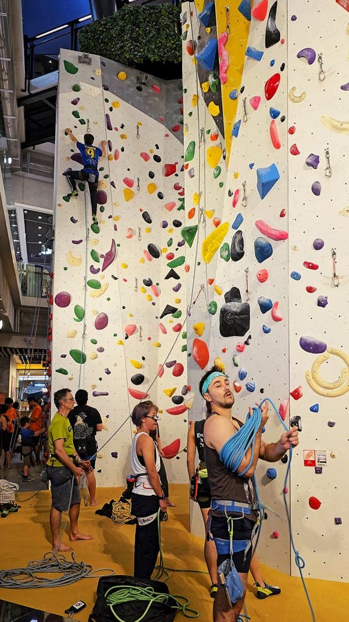 People rock climbing editorial photo. Image of indoors - 332180206