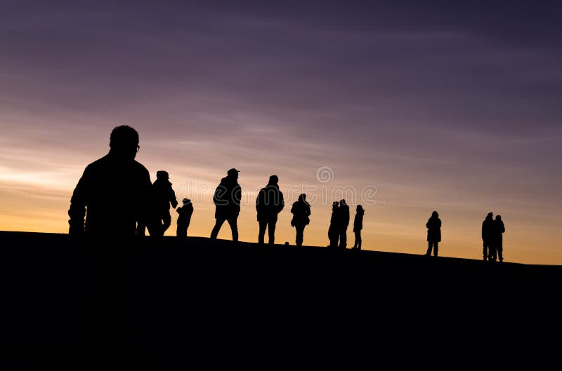 People on Roof Looking at the Sunset Stock Image - Image of horizon ...