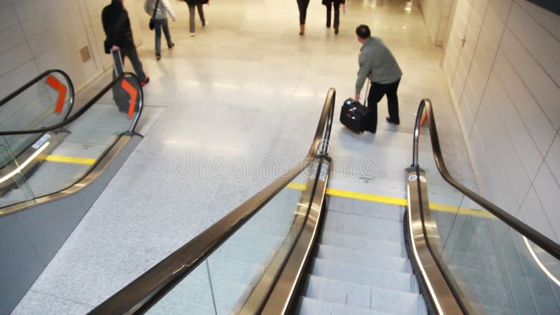 People Run Down Steps of Moving Escalator and Then Stock Video - Video ...