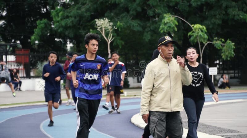 People run in slow motion stock footage. Video of recreation - 123138740