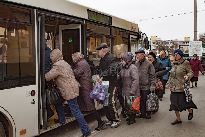 Crowd of People Getting on the Bus in Autumn in Europe Editorial Stock ...