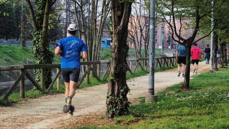 People Running at a Springtime Afternoon. Editorial Stock Image - Image ...