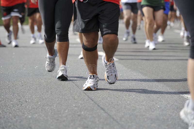 People running in street stock photo. Image of group - 16461944