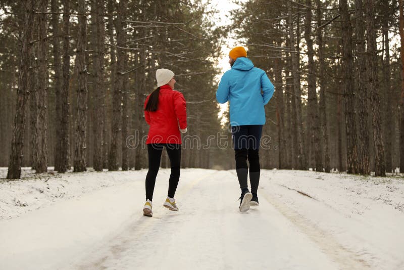 People Running in Winter Forest, Back View. Outdoors Sports Exercises ...