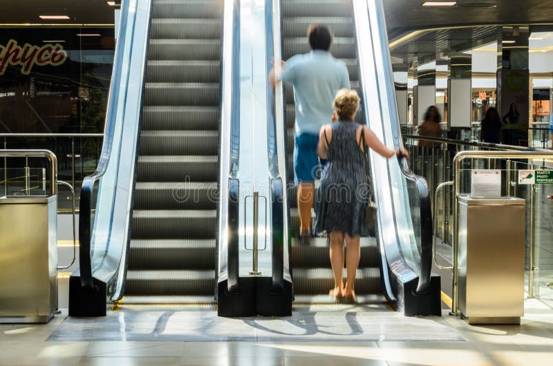 People Rush on Escalator Motion Blurred Editorial Photography - Image ...