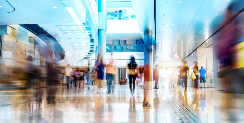 Rushing in the lobby stock photo. Image of blurred, column - 284478132