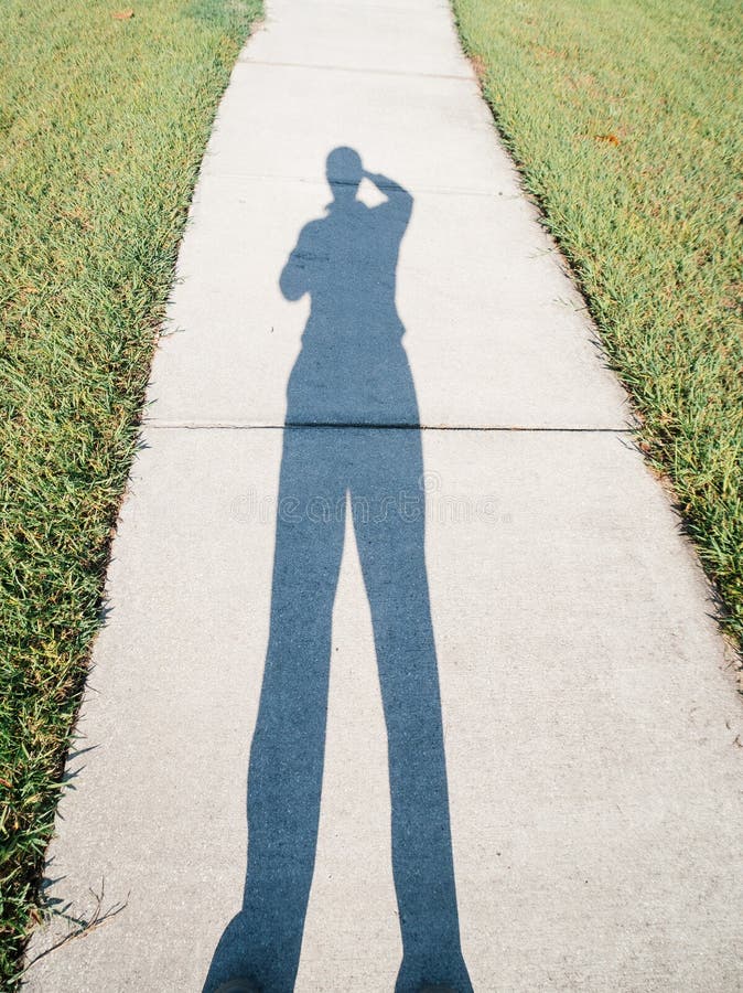 Human shadow stock photo. Image of grass, palms, acclimated - 144547936