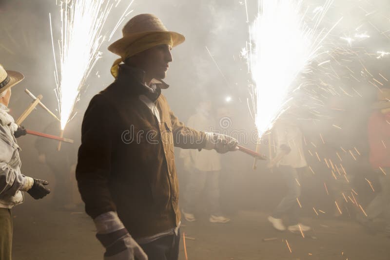People with Safety Clothes in Paterna with Fireworks in Their Hands ...