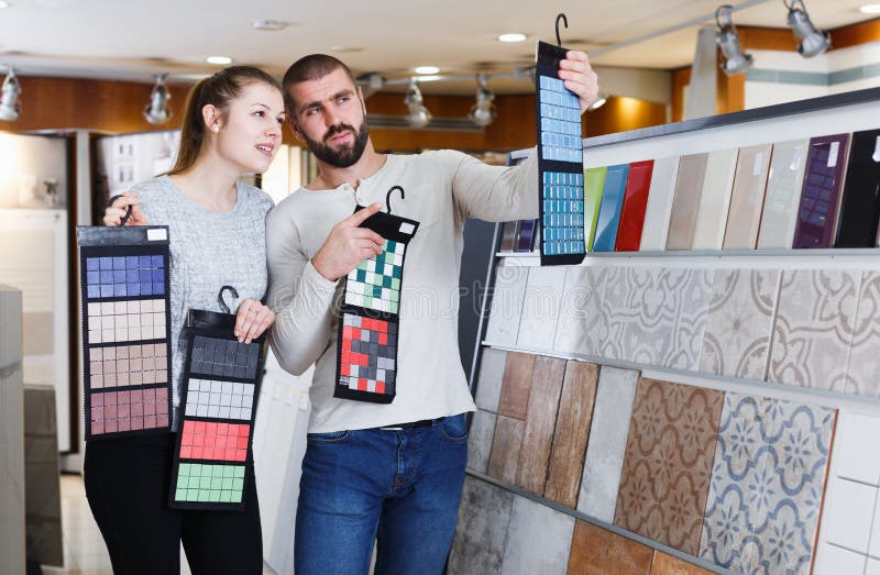 People with Sample of Ceramic Tile Stock Image - Image of male, people ...