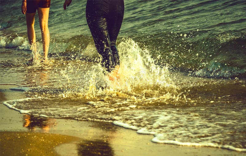 Beach walk stock photo. Image of pair, girls, sunny - 147584334