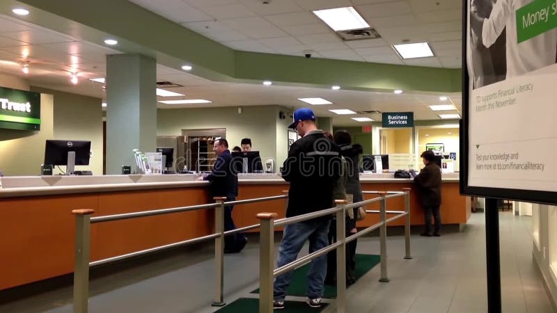 People at a Service Counter Talking To the Teller Stock Footage - Video ...