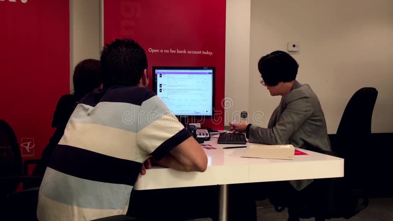 People at a Bank Counter Talking To the Teller Stock Footage - Video of ...