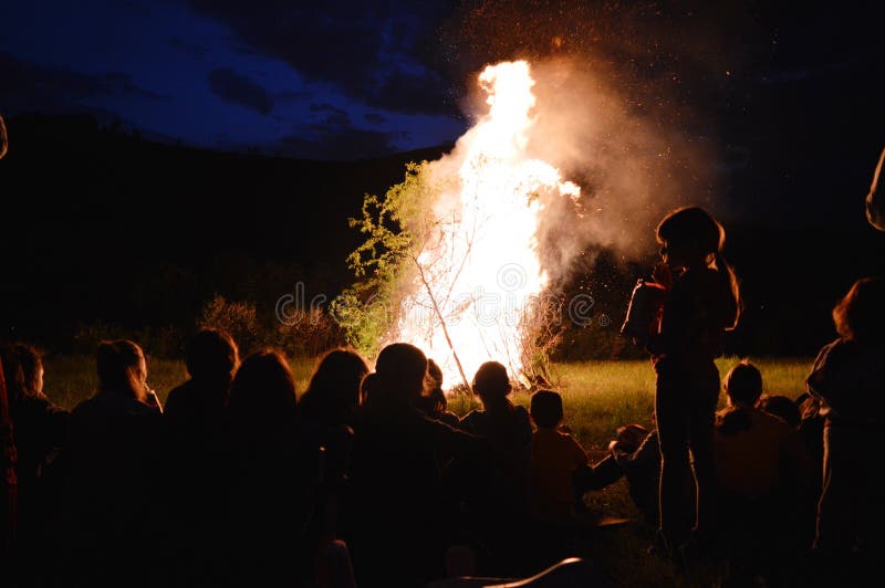 People Set Fire To Fire at Night Stock Image - Image of night, grass ...