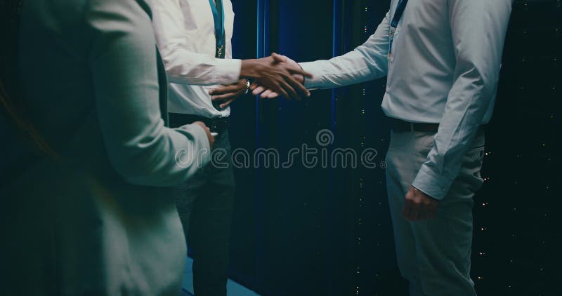 People, Shaking Hands and Server Room Success, Onboarding or Cyber ...