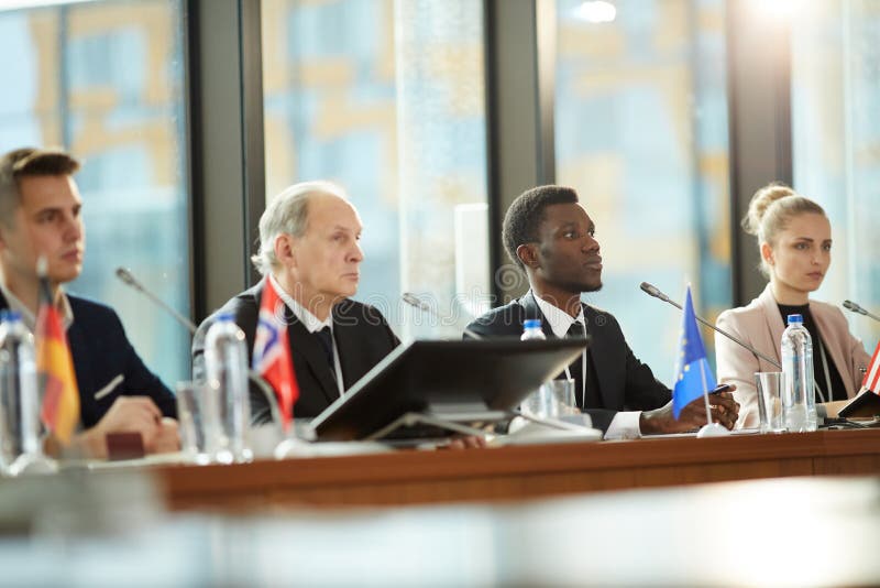 People Sitting at Conference Stock Photo - Image of listening, teamwork ...