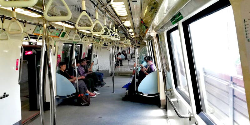 People Sitting Down on MRT Train Editorial Stock Image - Image of ...
