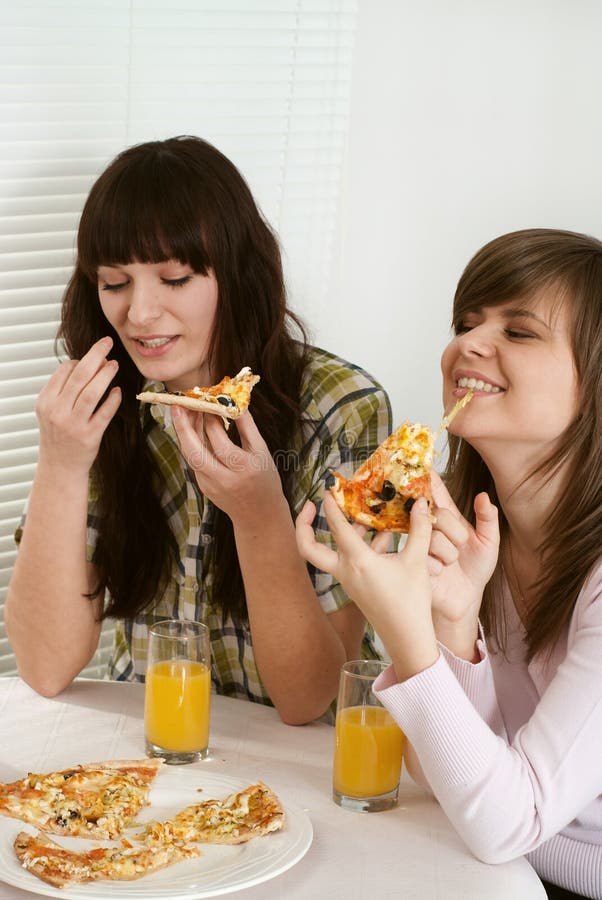 People Sitting Eating Pizza Stock Photo - Image of attractive ...