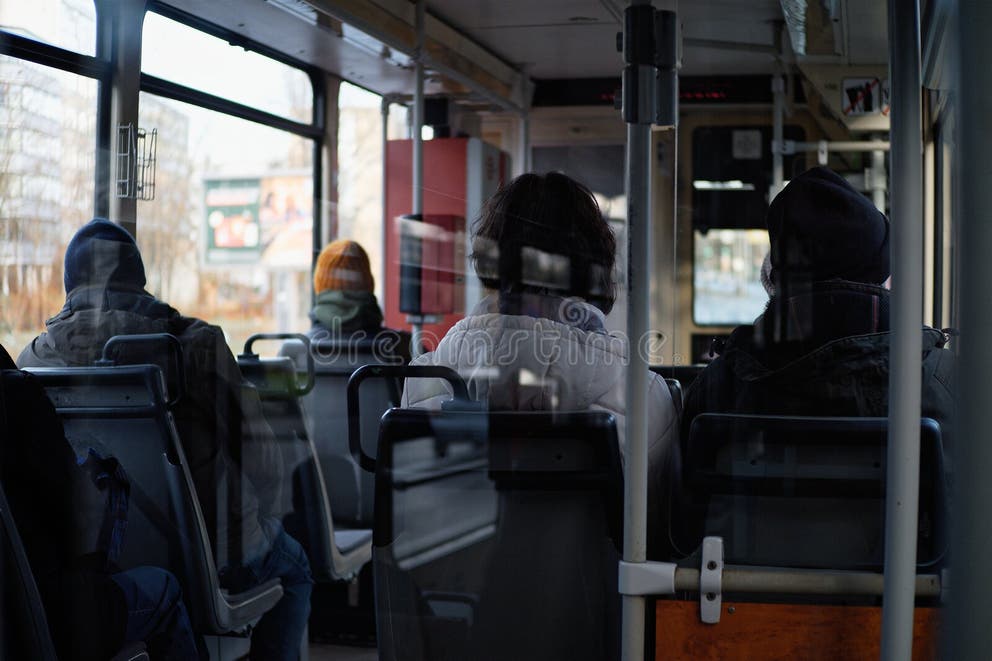 People Sitting on the Front of a Bus with Chairs on Stock Photo - Image ...