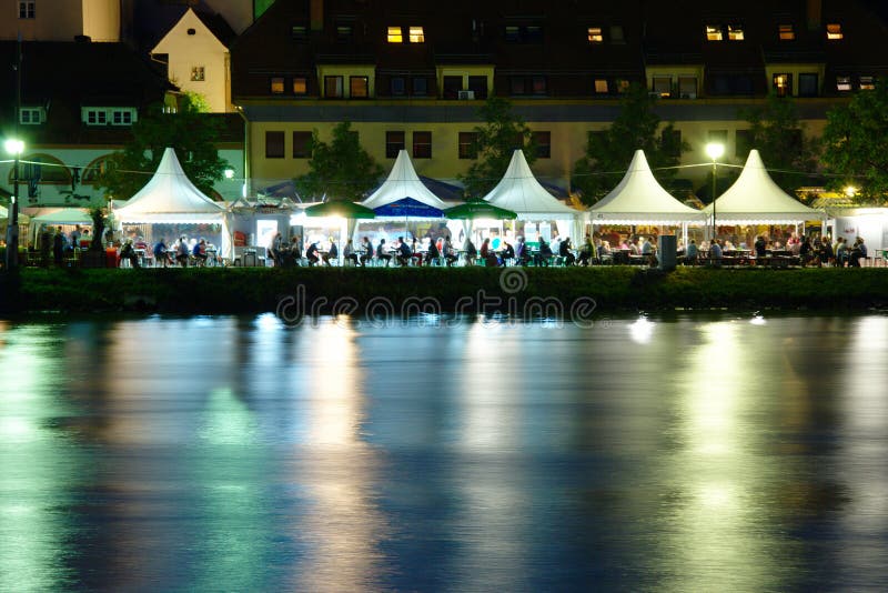 People Sitting in Outdoor Cafes by the Shiny River Editorial ...