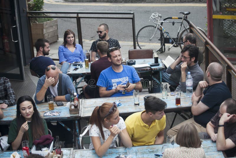 People are Sitting Outside of the Pub Editorial Stock Image - Image of ...