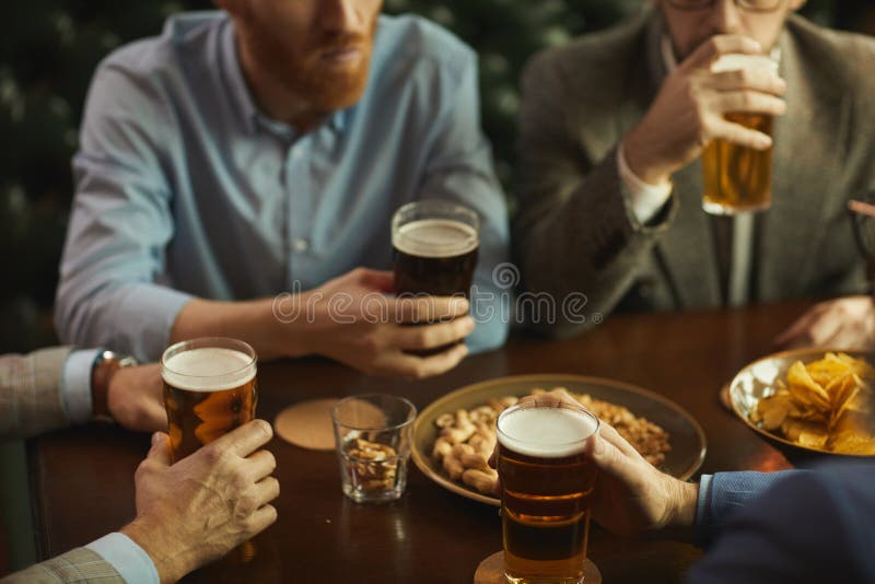 People sitting in the pub stock photo. Image of relaxation - 176941998