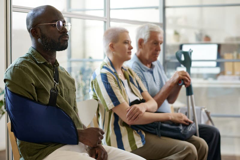 Group of People Sitting in a Queue in Social Service Stock Image ...