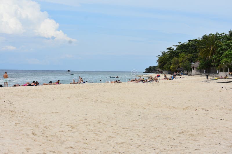 A People Sitting on Sandy Beach Editorial Image - Image of people ...