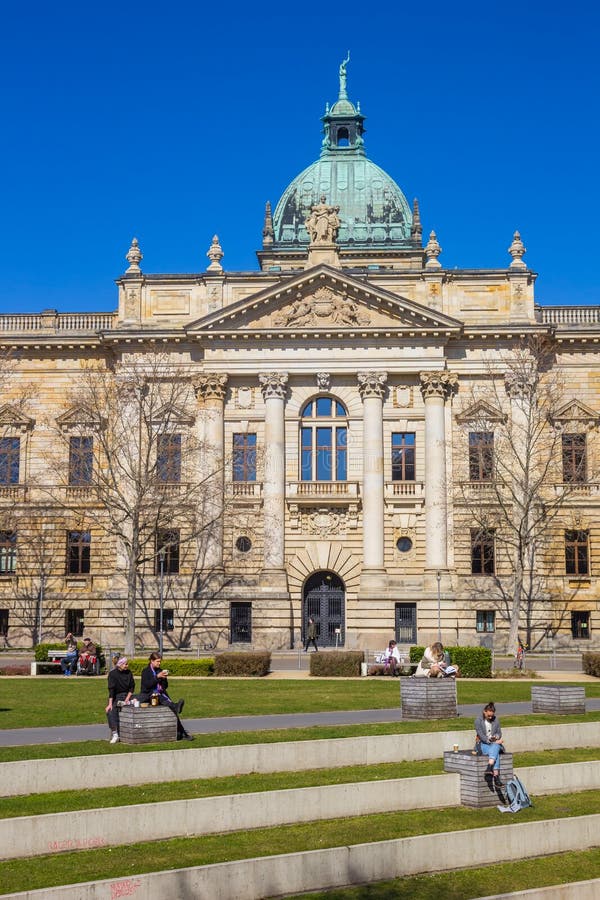 People Sitting in the Sun in Front of the Courthouse in Leipzig ...