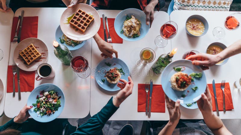 People are Sitting at a Table and Eating. Top View Stock Photo - Image ...