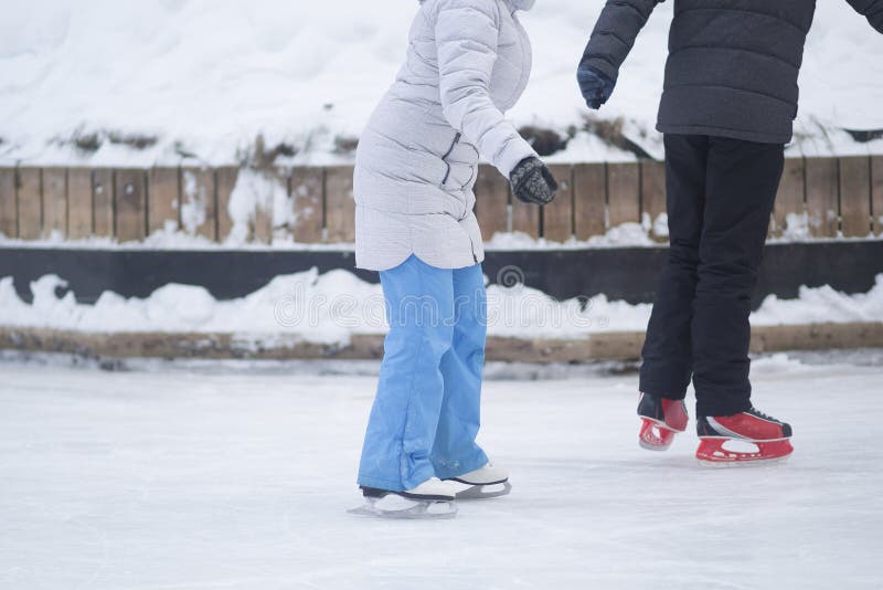 People Skate in the Winter in the Cold on the Ice Rink Stock Image ...