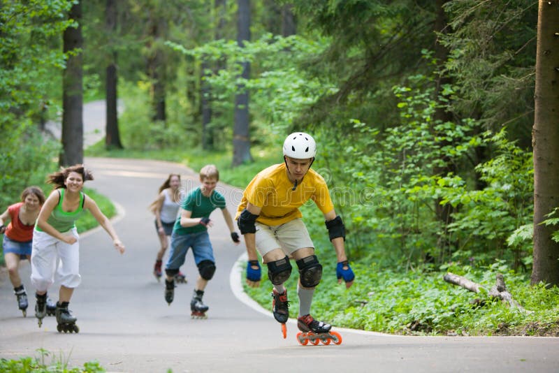 People skating at park stock photo. Image of females - 12475590