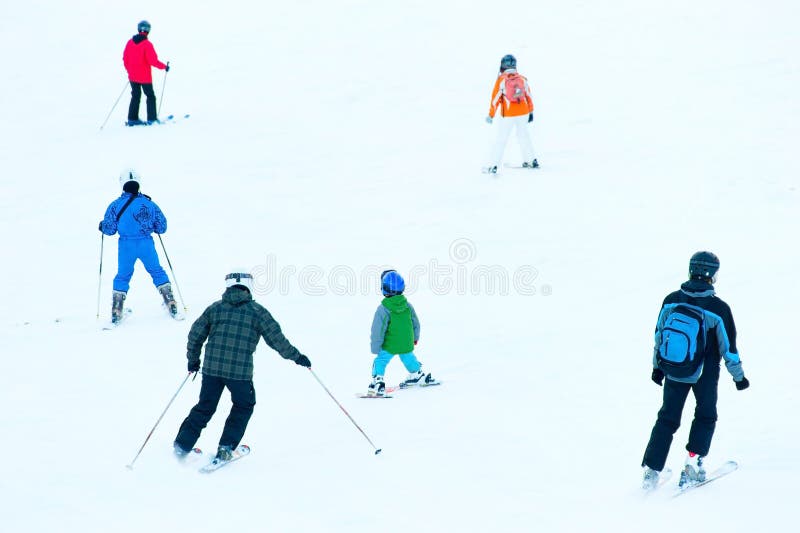 People Skiing on a slope stock photo. Image of clothing - 65986834