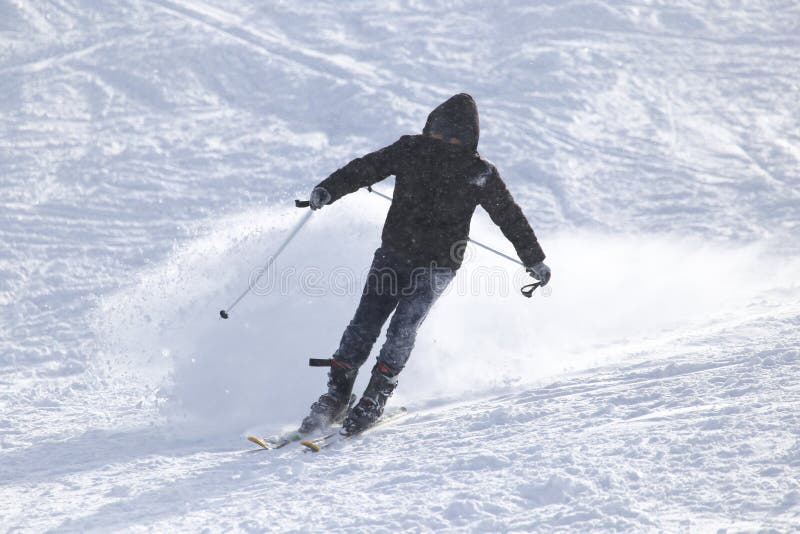 People skiing in the snow stock photo. Image of blue - 111287610