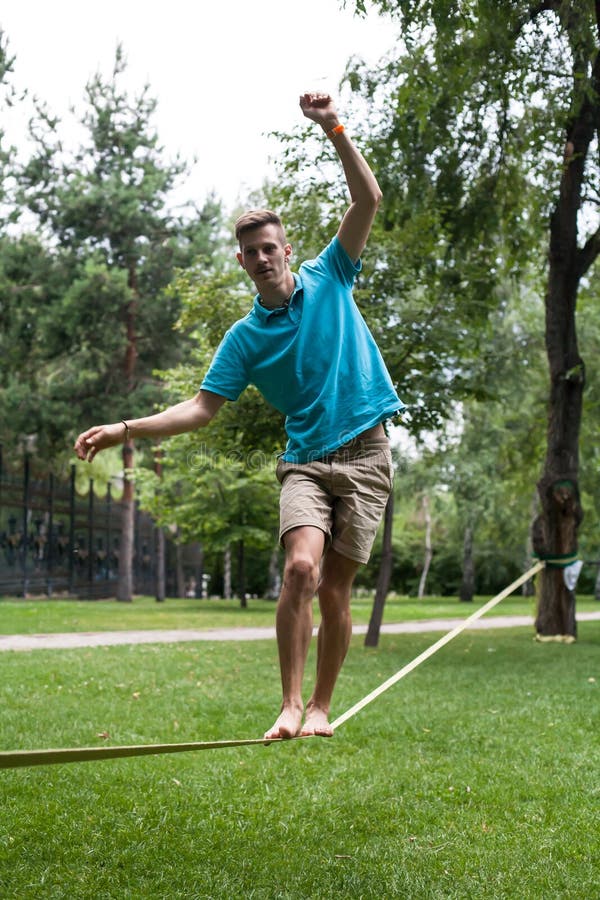 People in the slackline stock image. Image of achievement - 32840987